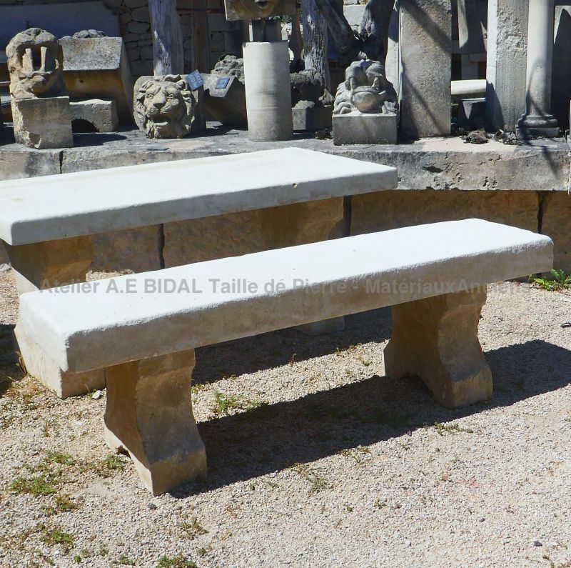 Old-fashioned piece of garden furniture : elegant limestone bench