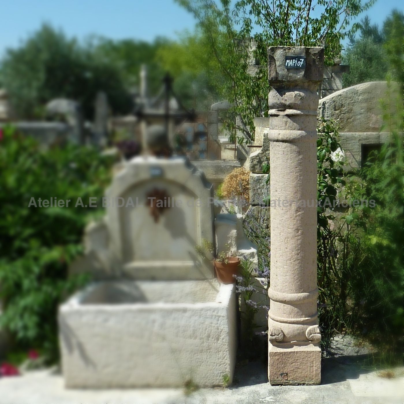 Old pillar - an old stone pillar with base and top.