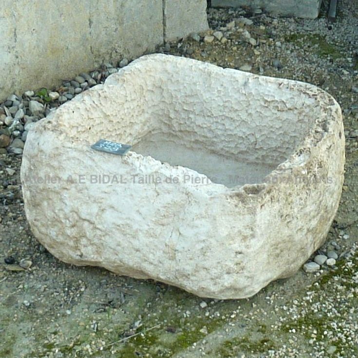 Small antique stone trough with an ocher color ** SOLD