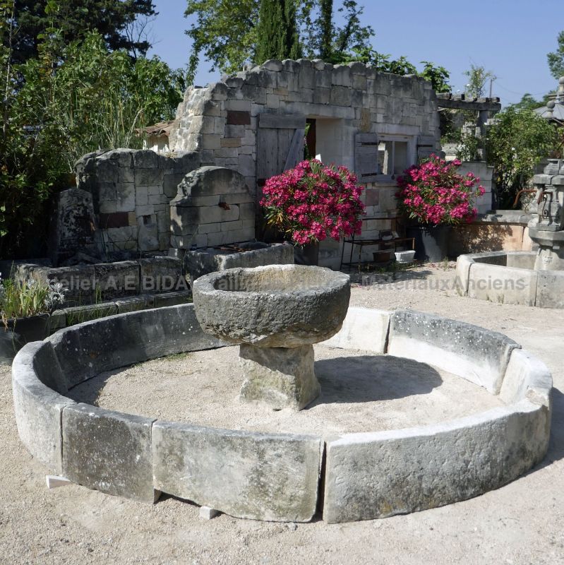 Large rustic basin in old stones for outdoor landscaping