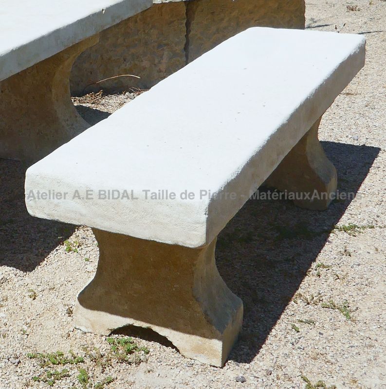 Old-fashioned piece of garden furniture : elegant limestone bench