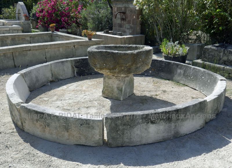 Large rustic basin in old stones for outdoor landscaping
