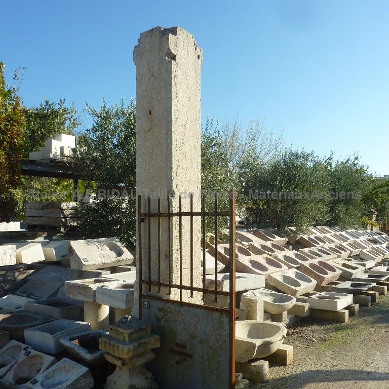 Old pillar in a rustic style- old pillar made of Cassis stone.