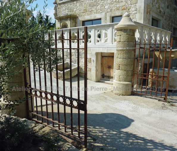 Old wicket gate fully openwork- with 2 riveted gates made of wrought iron.