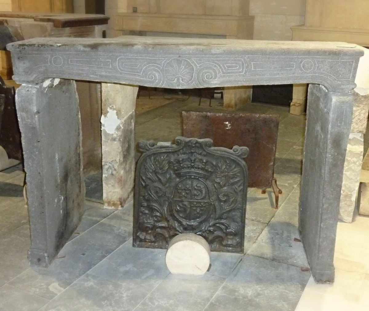 Louis XV fireplace made of black lava stone - Ancient Regence mantle.