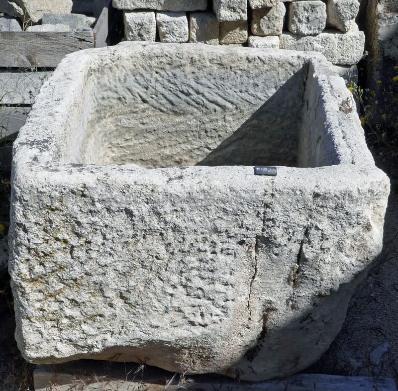 Elegant stone trough in a rural style ideal as a stone planter.