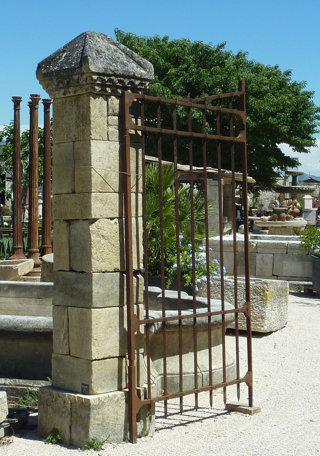 Metal Gates With Stone Columns