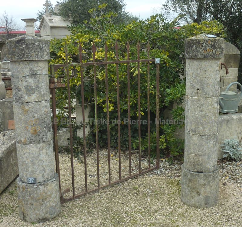 A old small stone pillar with a cylindrical shape- sold in set of 2.