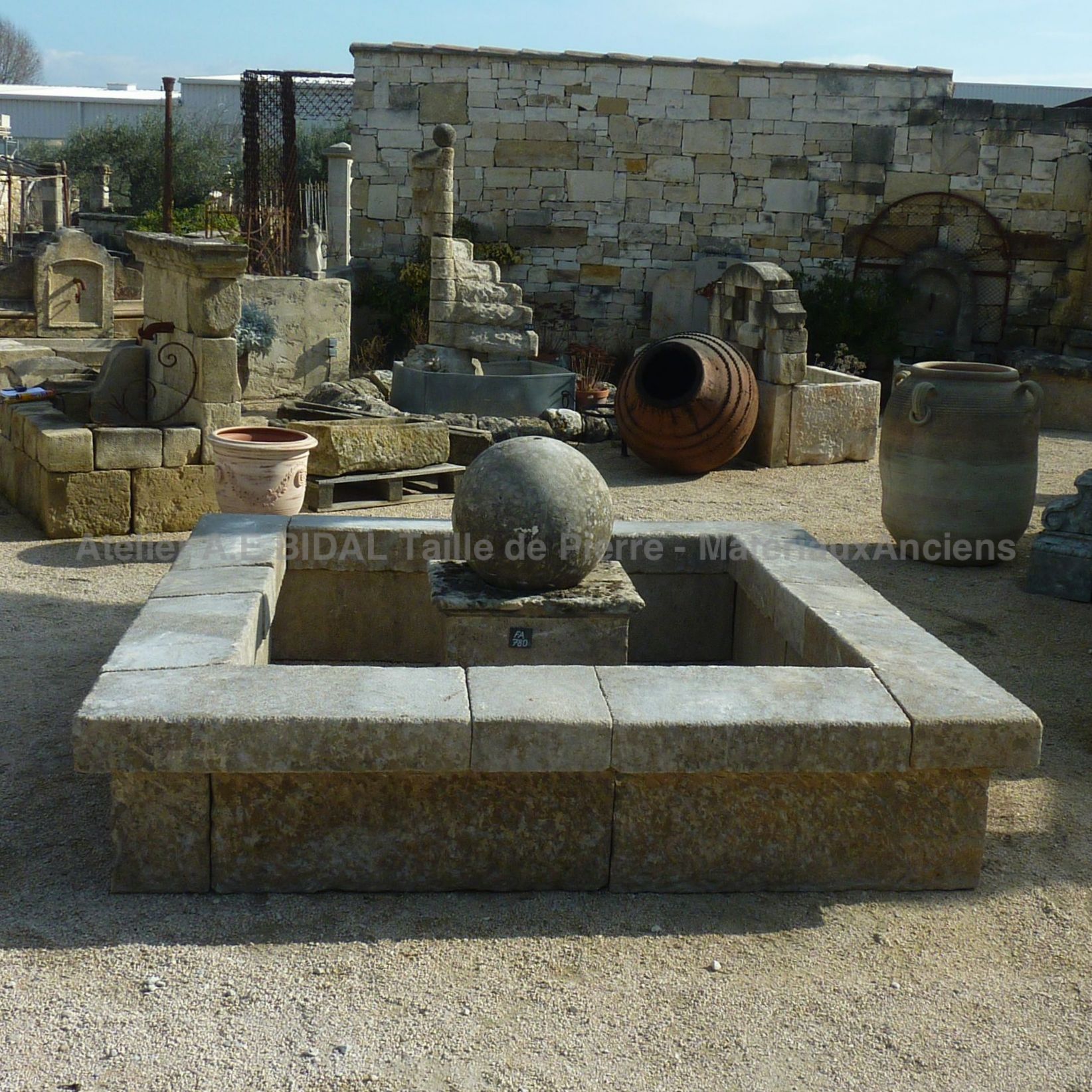 Wonderful antique basin with little central post and stone sphere.