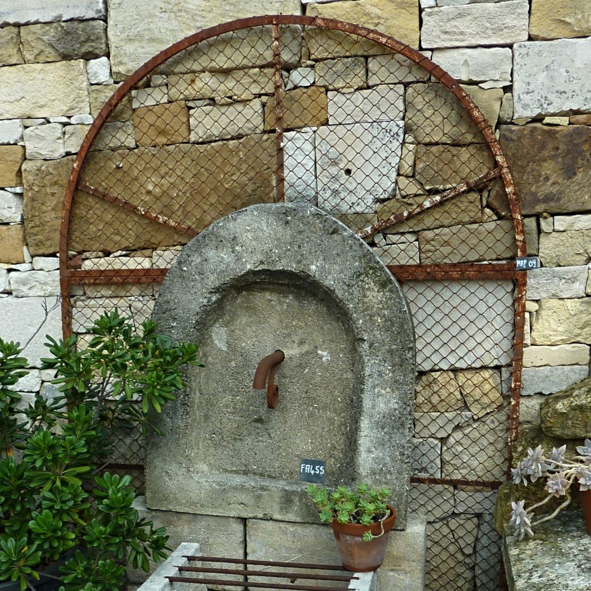 Our antique wrought iron grid, a decorative garden grid.