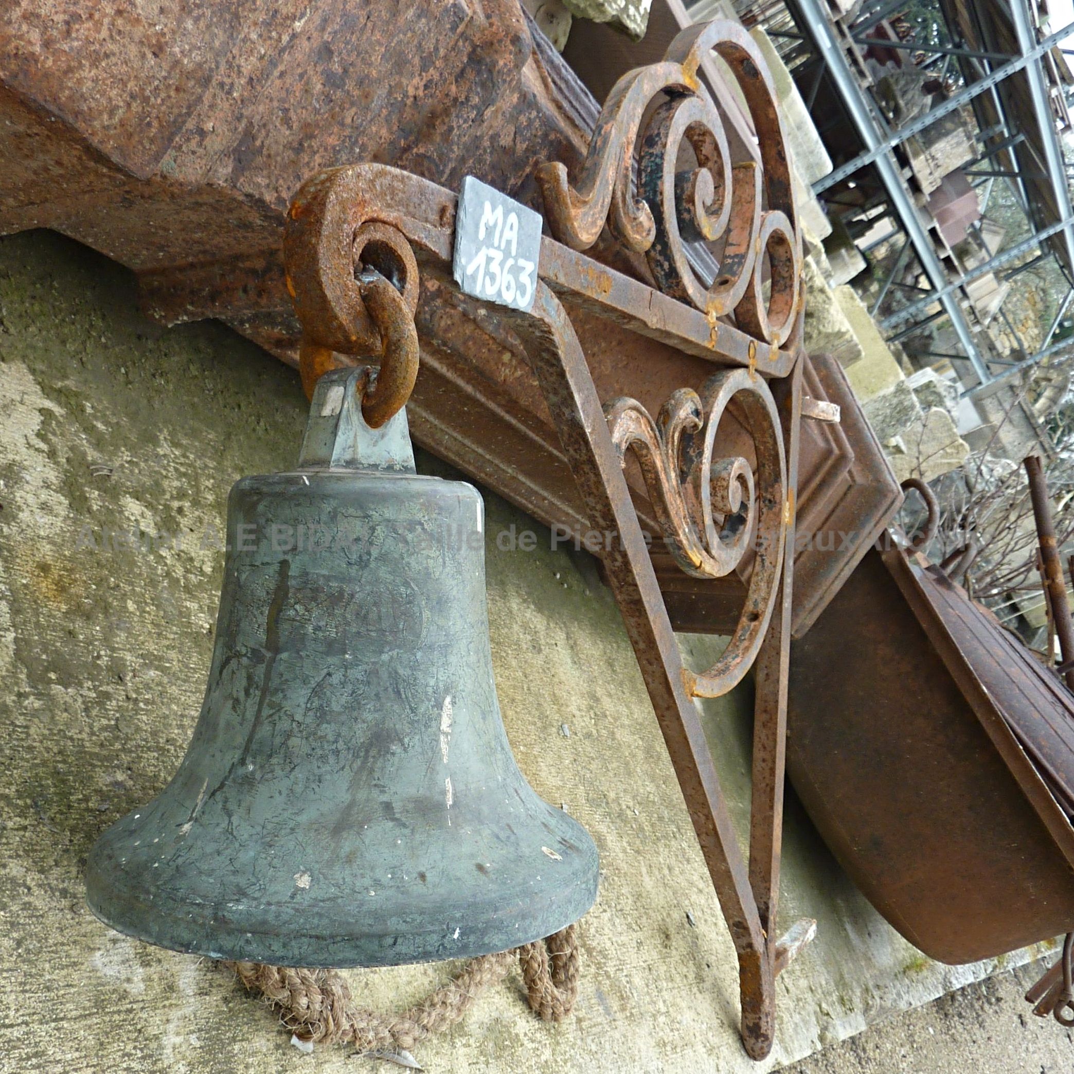 Wonderful antique bronze wall-mounted bell with its wrought iron ...