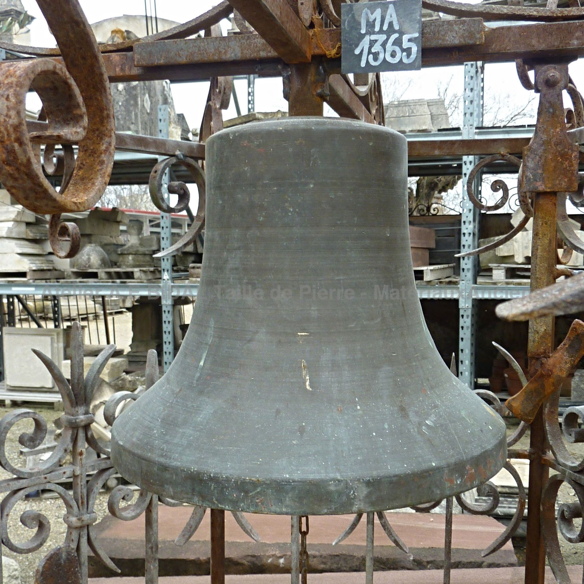 Old bells - old bell that is 2 meters high, with a wrought iron structure.