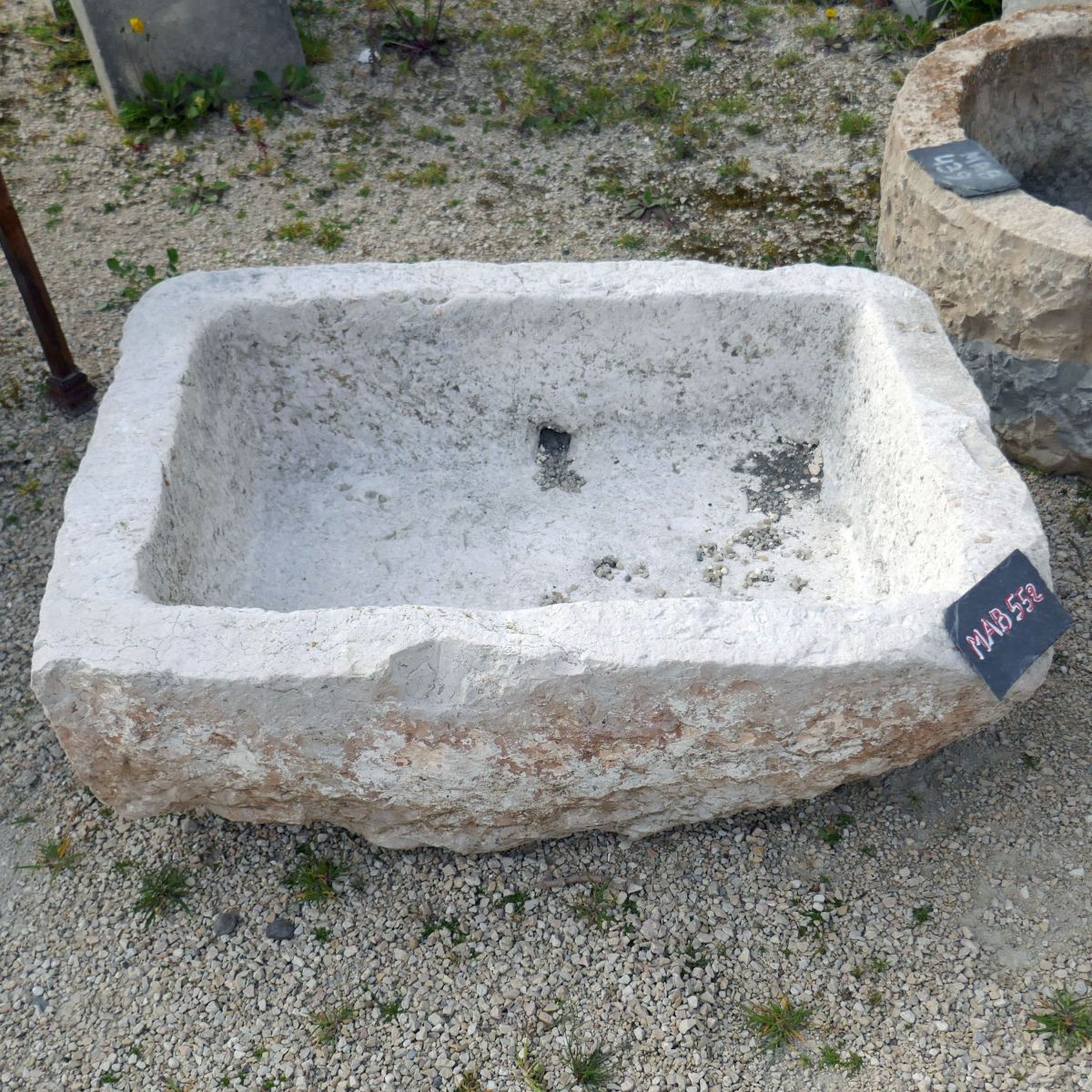 Eco-friendly and sturdy planter : small and shallow trough in stone