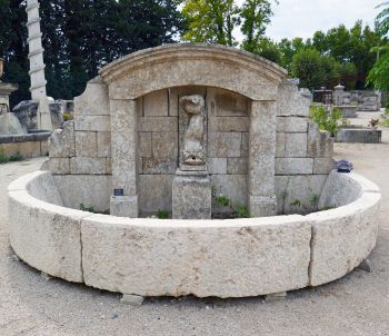 Wall fountain with half-moon basin and beautiful hand sculpted dolphin