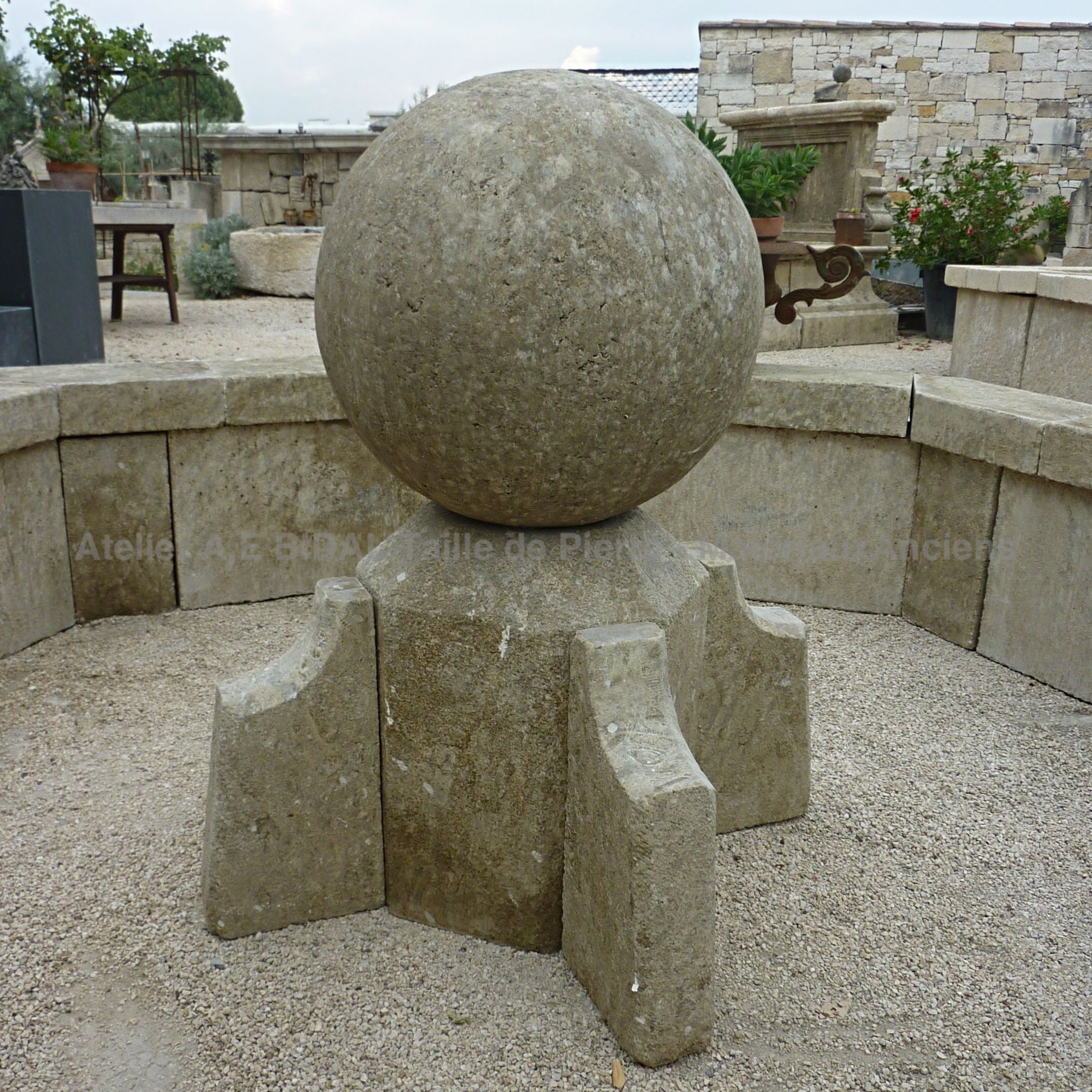 For the layout of your garden, elegant ancient stone basin with ball