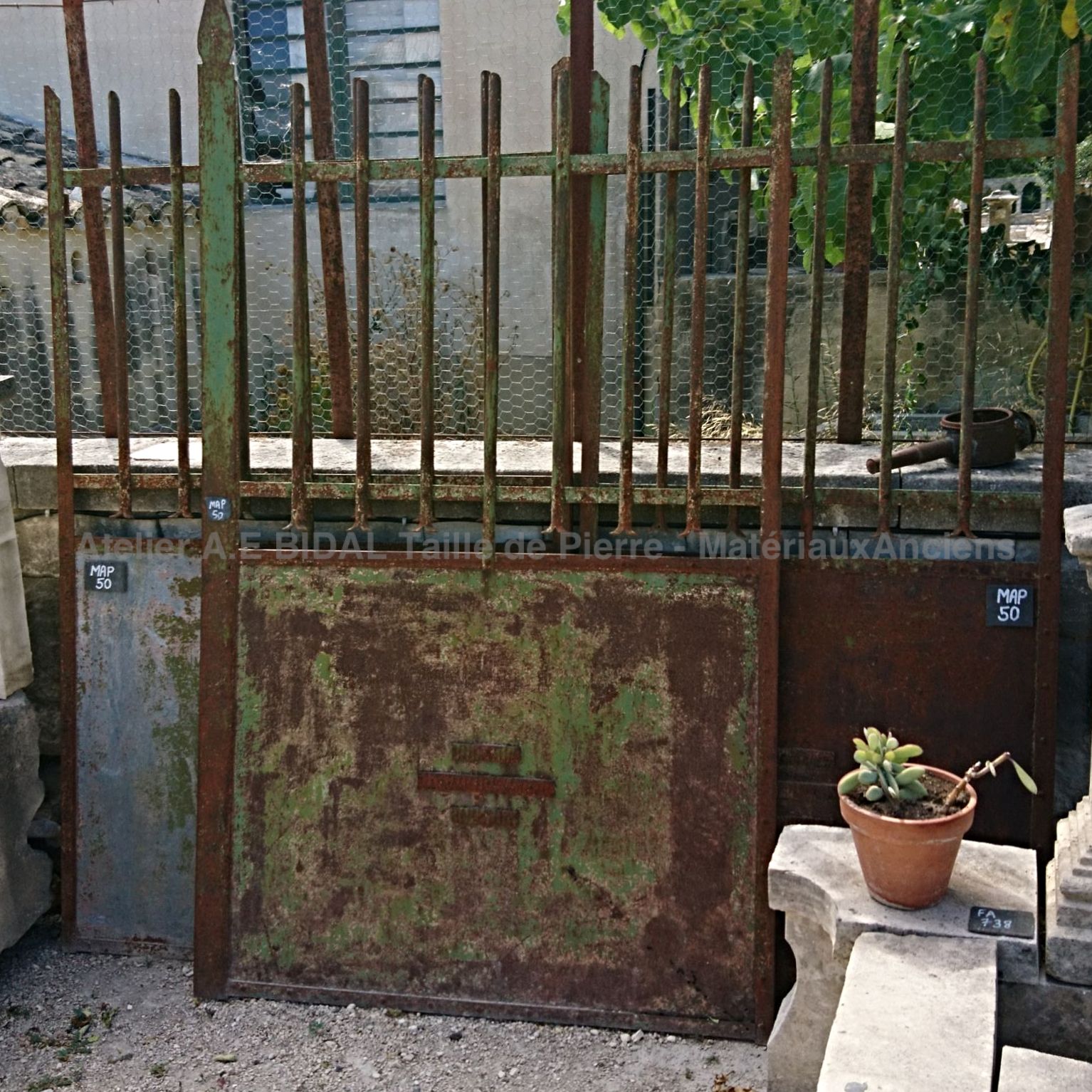 Old wrought iron wicket gate - with 3 openwork doors