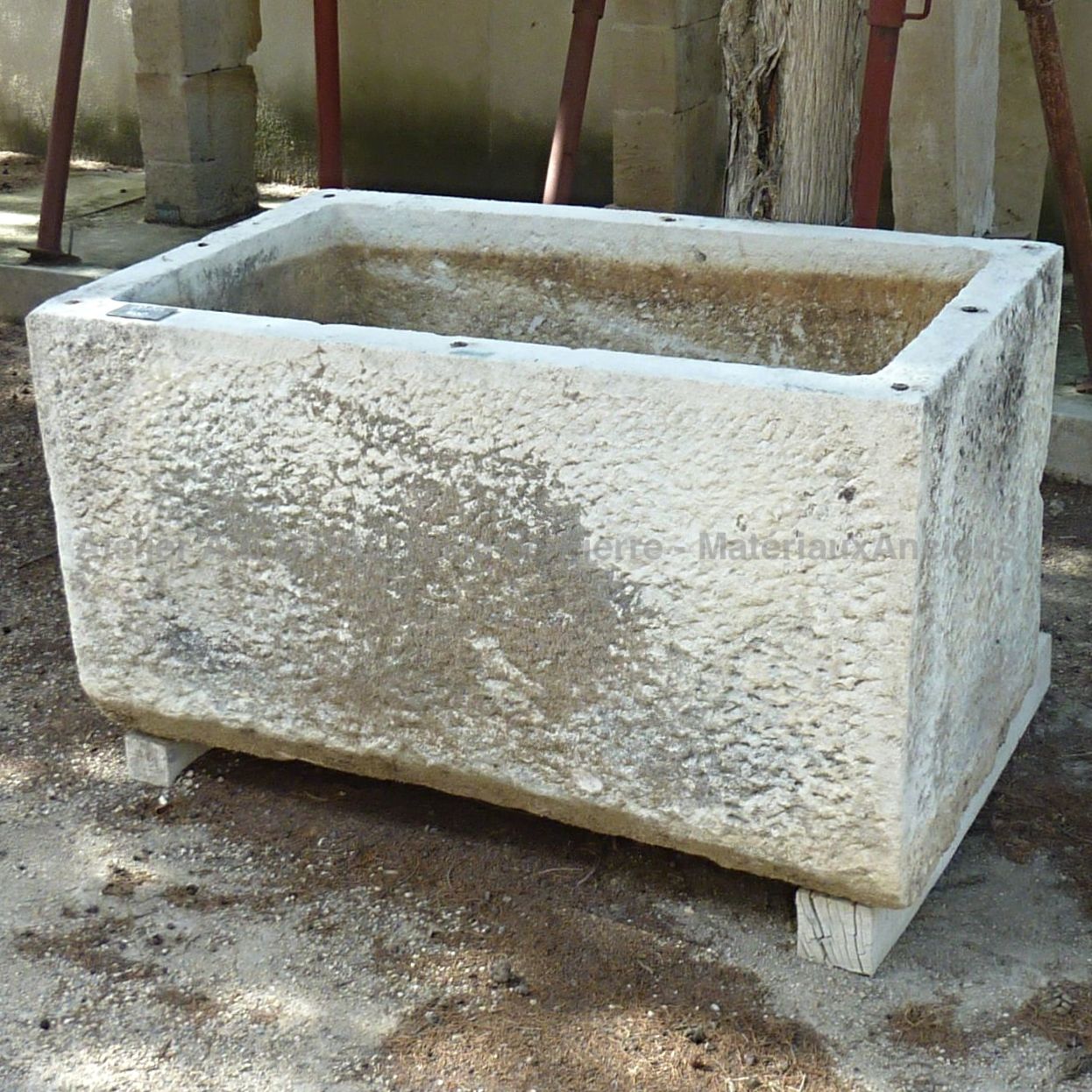 Large rectangular ancient stone : robust trough carved in hard stone
