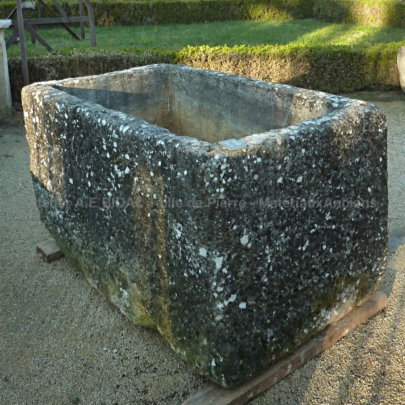 Antique rectangular stone trough with a large capacity and patina