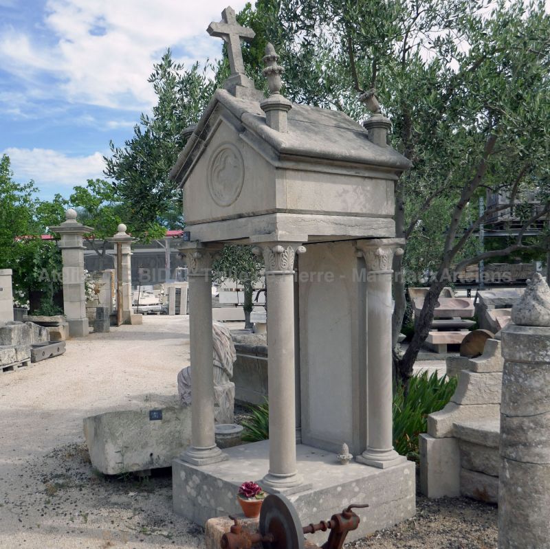 Beautiful stone chapel with carved cross | Ancient religious element